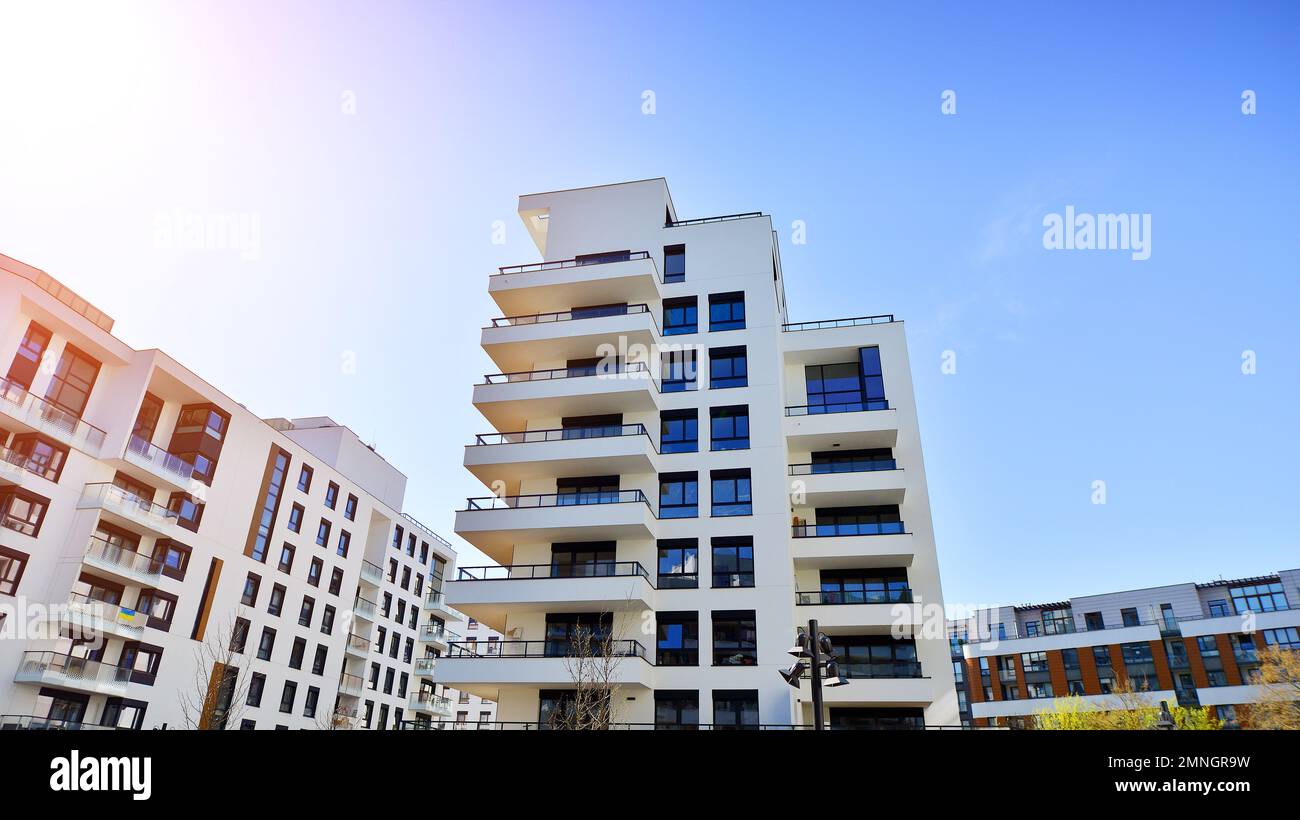 Futuristic square architecture of apartment building. Real estate with ...