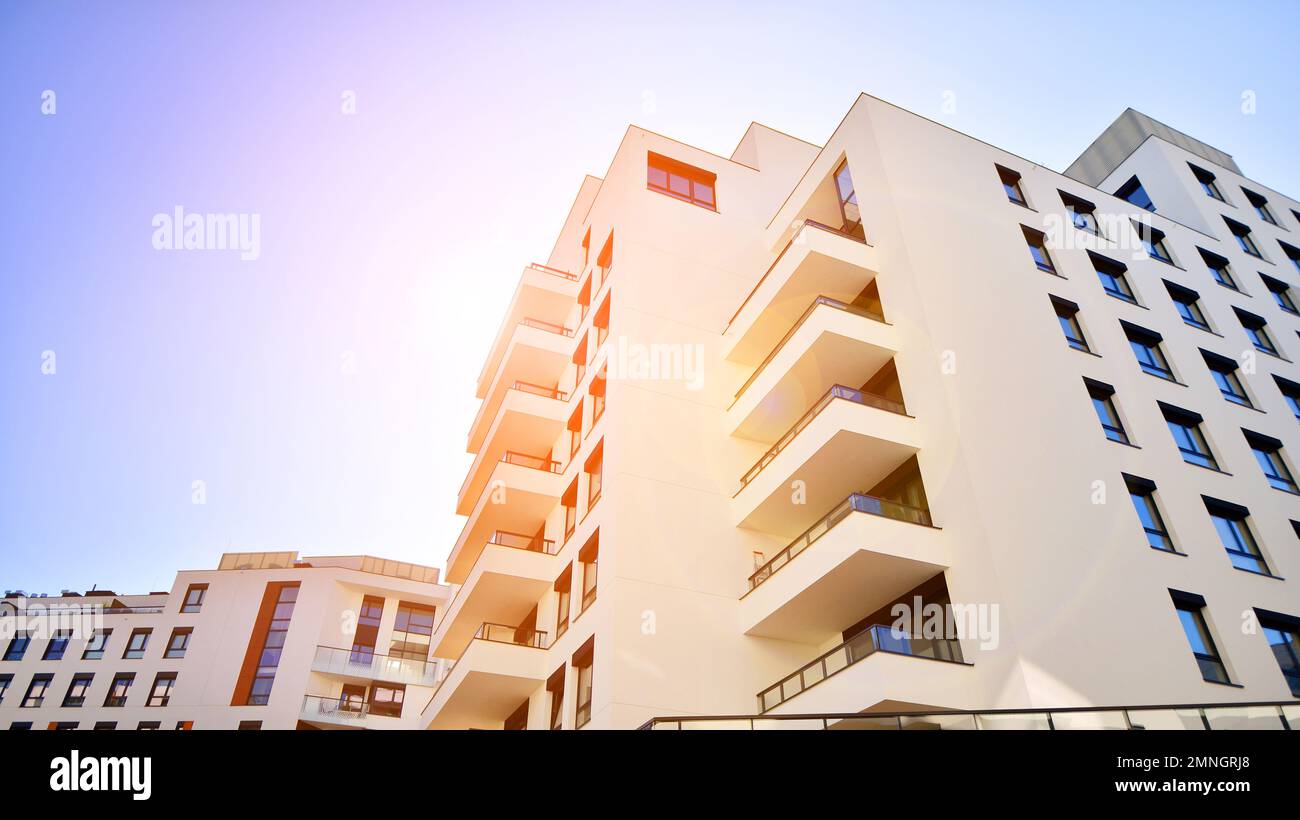 Futuristic square architecture of apartment building. Real estate with ...