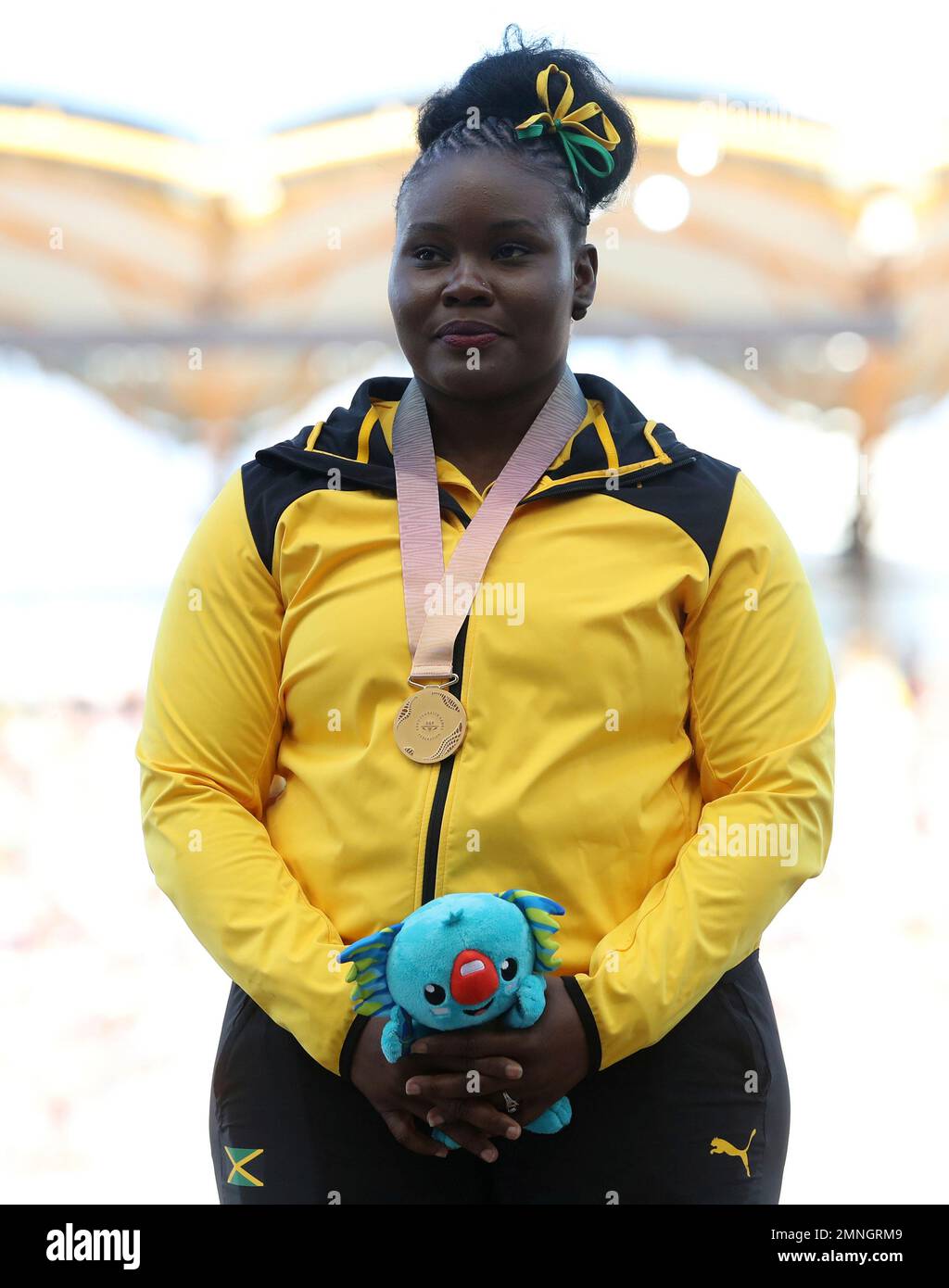 Women's shot put gold medalist Jamaica's Danniel Thomas-Dodd stands on ...