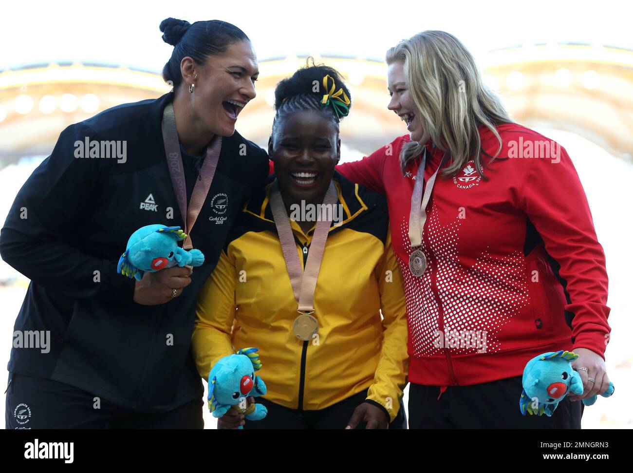 Women's shot put gold medalist Jamaica's Danniel Thomas-Dodd, centre ...