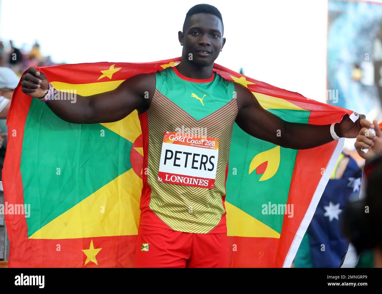 Granada's Anderson Peters celebrates after winning the bronze medal in ...