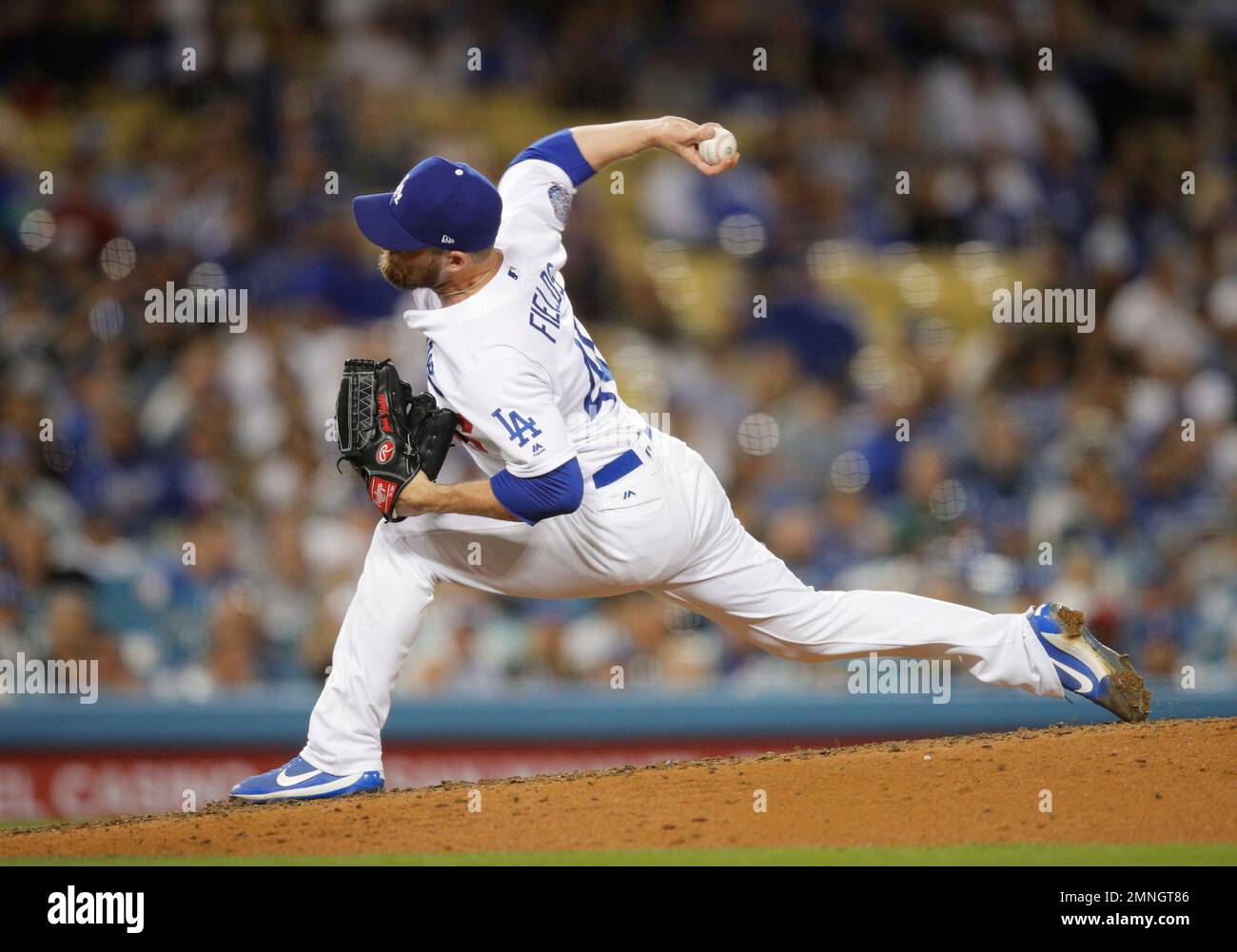 Los Angeles Dodgers relief pitcher Josh Fields throws against the ...
