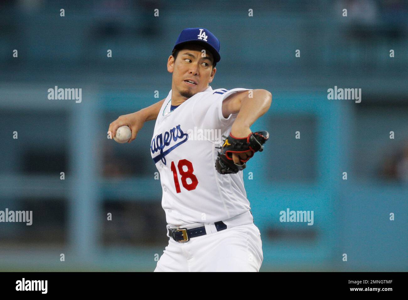 Los Angeles Dodgers starting pitcher Kenta Maeda, of Japan, throws ...
