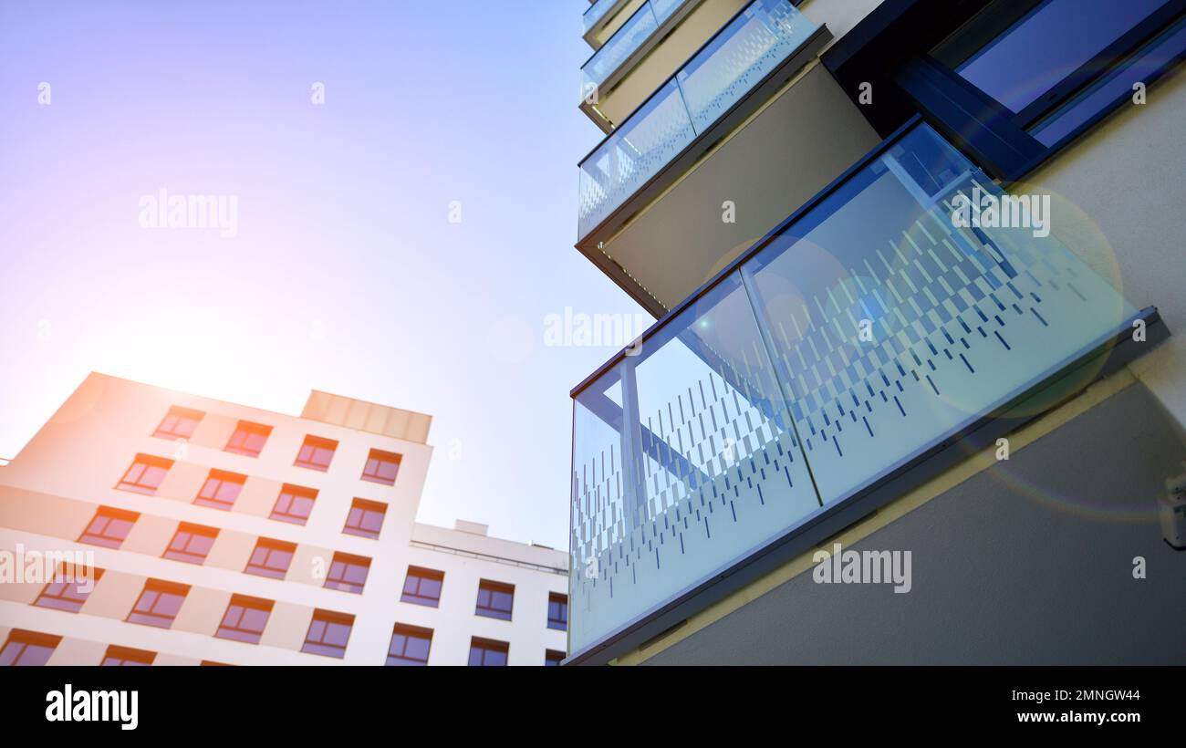 Futuristic square architecture of apartment building. Real estate with ...