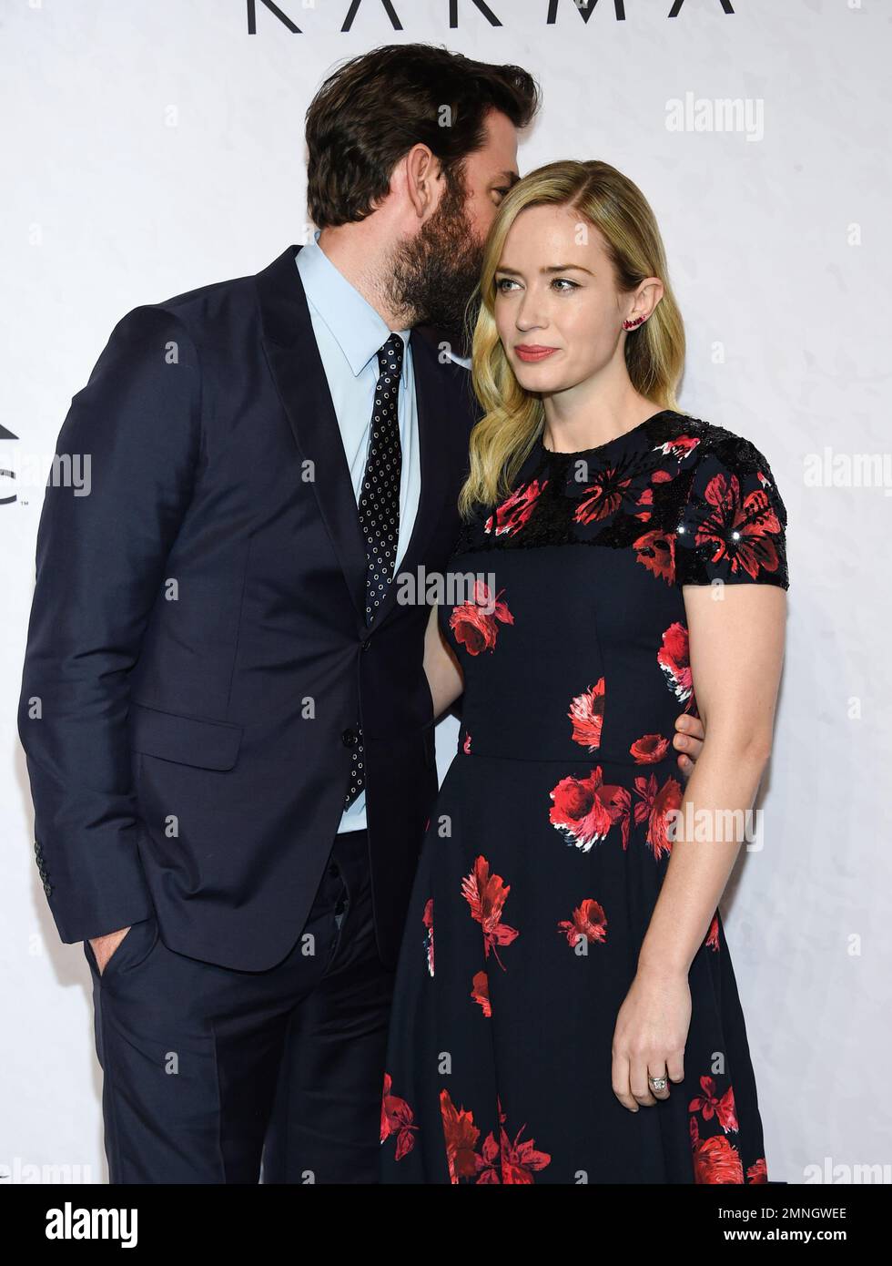 Actor/director John Krasinski, left, and wife, honoree Emily Blunt ...
