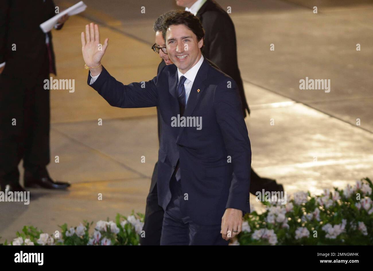 Canada's Prime Minister Justin Trudeau waves to the press upon his ...