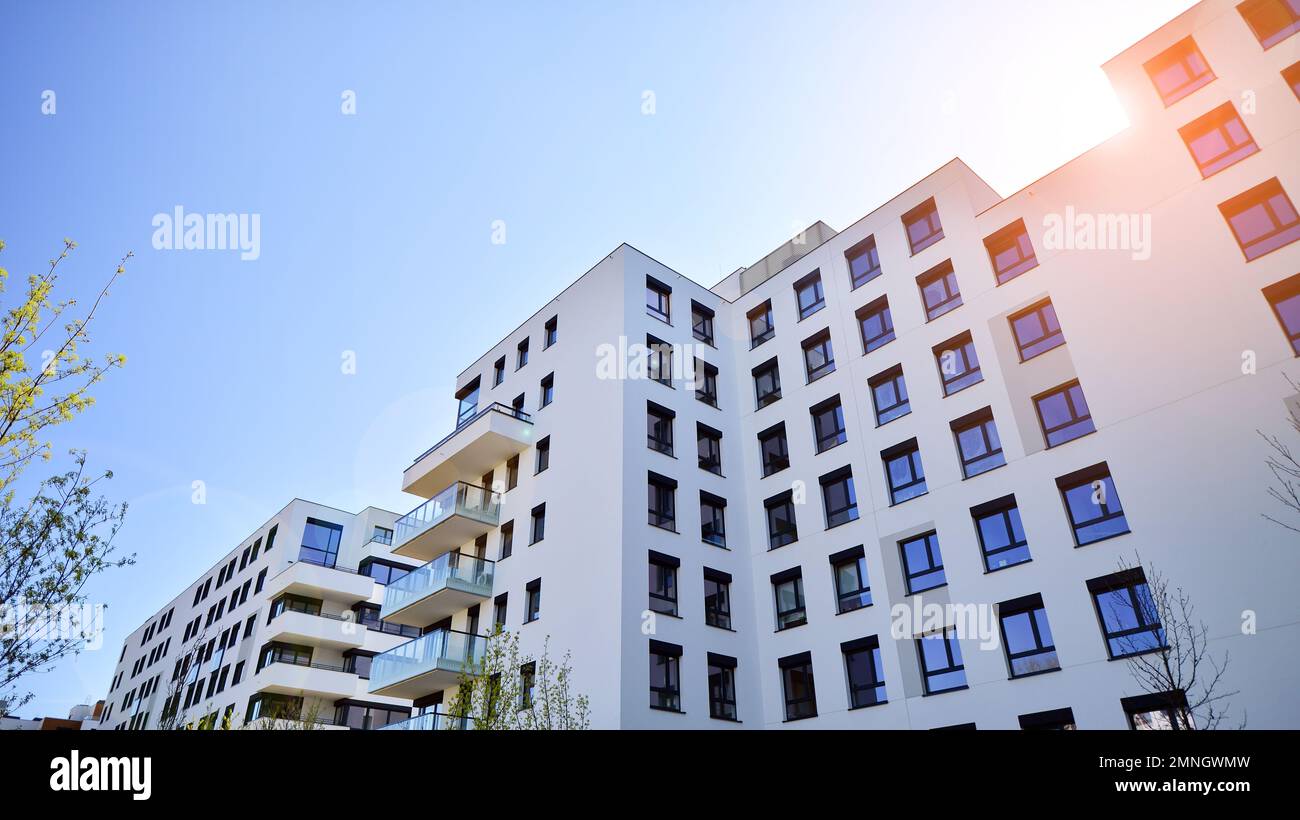 Futuristic square architecture of apartment building. Real estate with ...