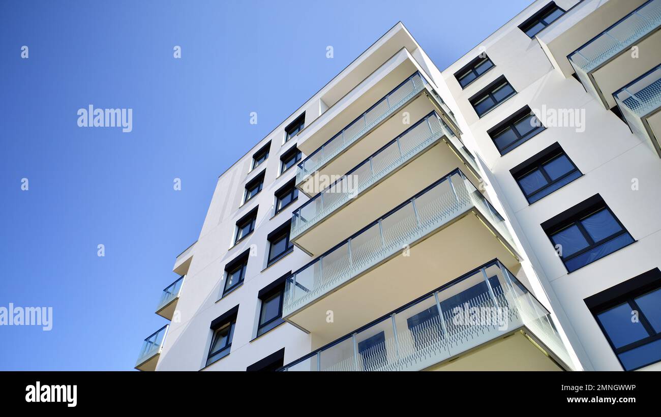 Futuristic square architecture of apartment building. Real estate with ...