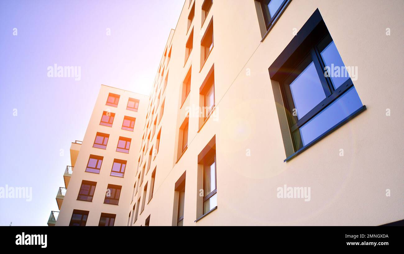 Futuristic square architecture of apartment building. Real estate with ...