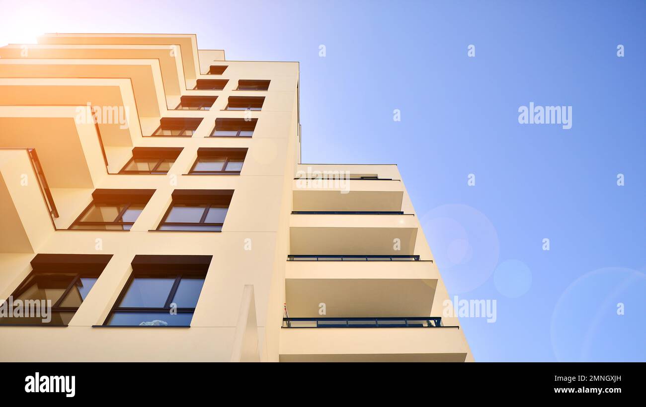 Futuristic square architecture of apartment building. Real estate with ...