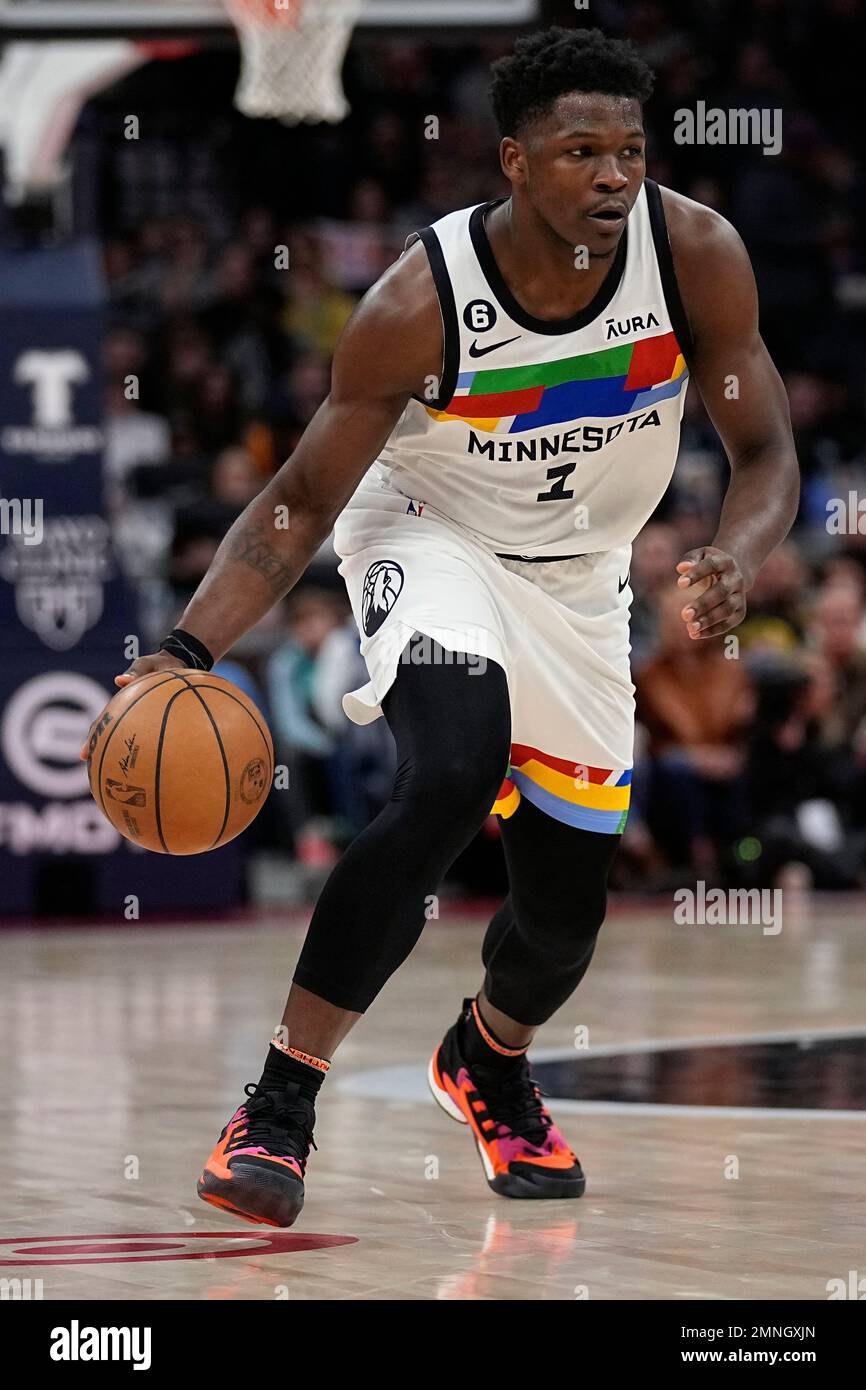 Minnesota Timberwolves guard Anthony Edwards (1) dribbles down the ...
