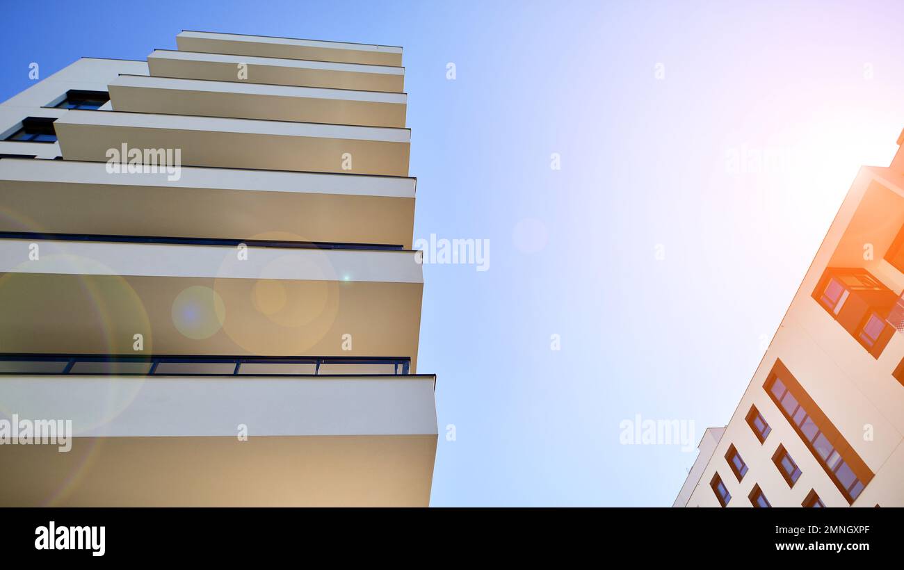 Futuristic square architecture of apartment building. Real estate with ...