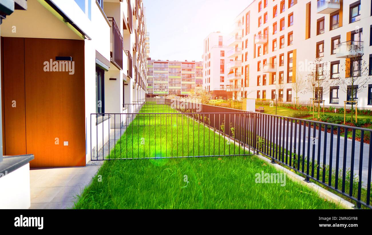 Futuristic square architecture of apartment building. Real estate with ...