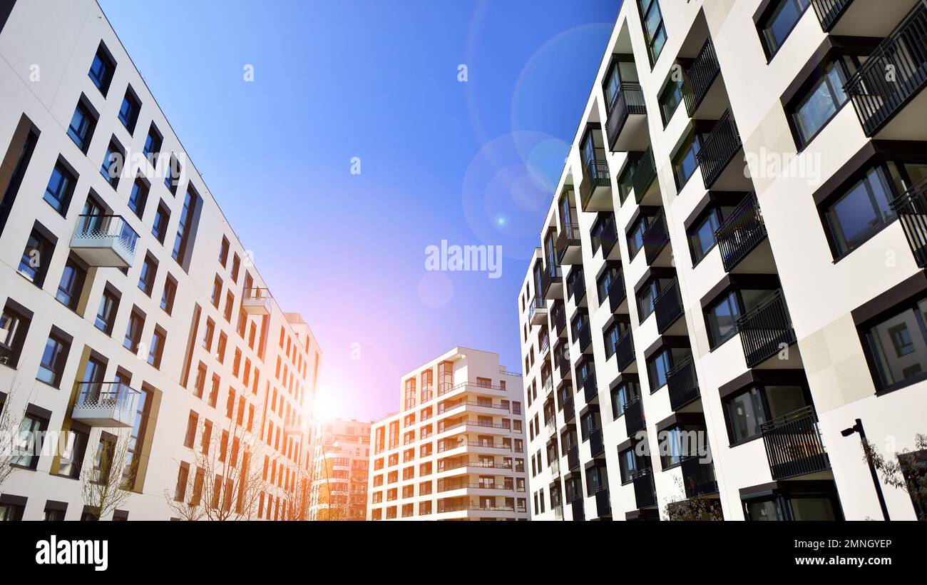 Futuristic square architecture of apartment building. Real estate with ...