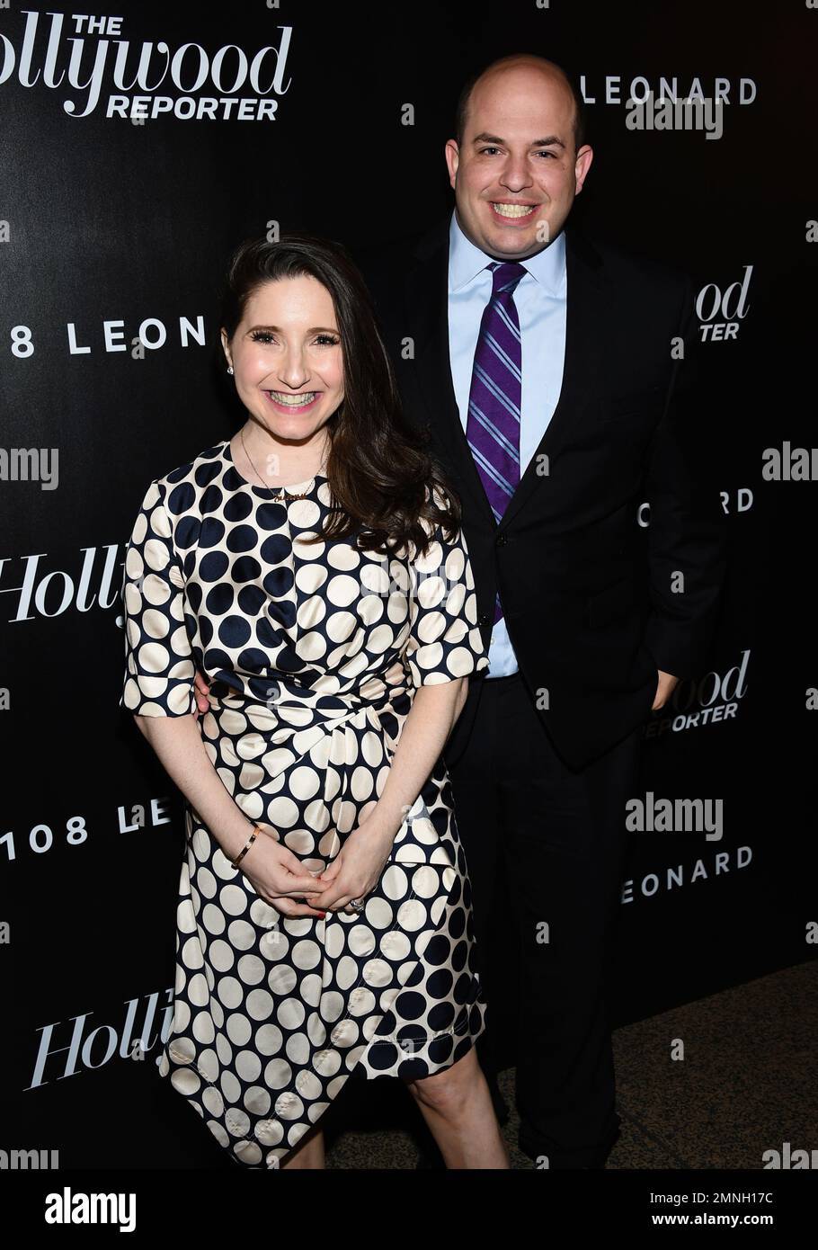 Journalist Brian Stelter, left, and wife Jamie Shupak Stelter attend ...