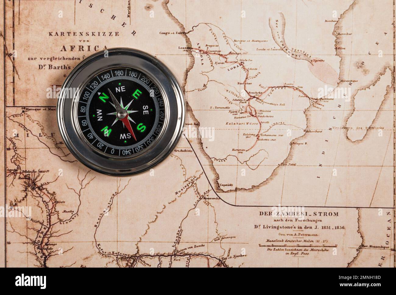 Compass on the vintage map; Adventure background Stock Photo - Alamy
