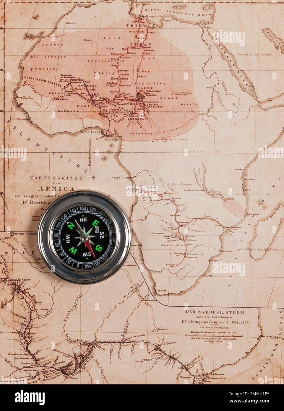 Compass on the vintage map; Adventure background Stock Photo - Alamy
