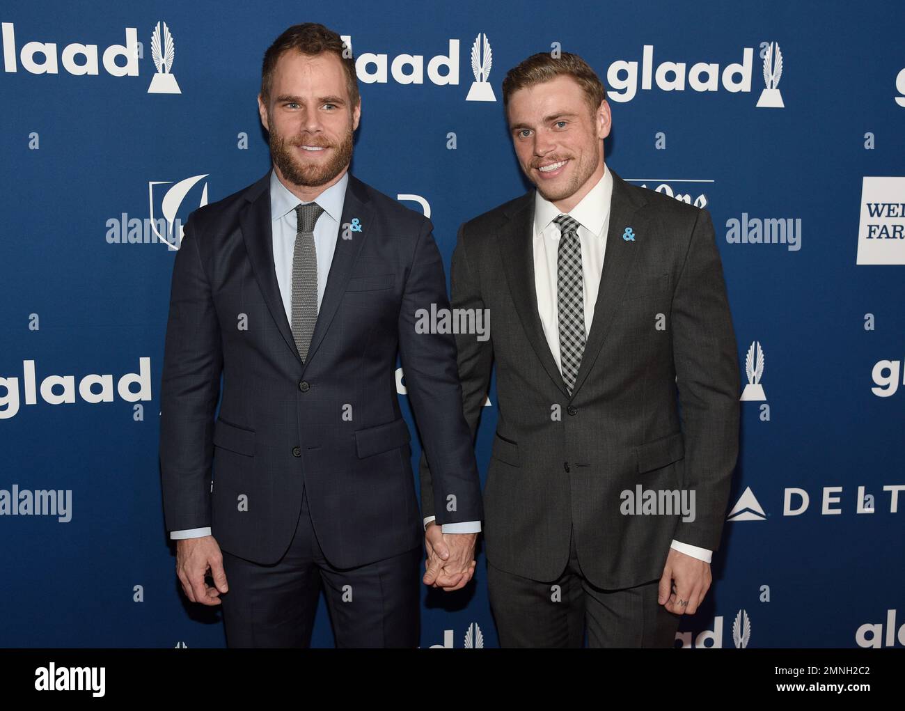 Matthew Wilkas, left, and Gus Kenworthy arrive at the 29th annual GLAAD ...