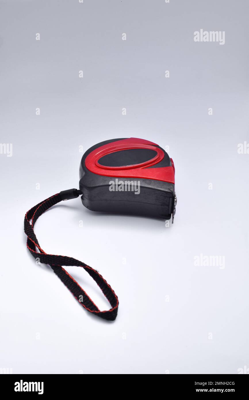 Roll-up metal meter for hobbies and work on a white background Stock ...