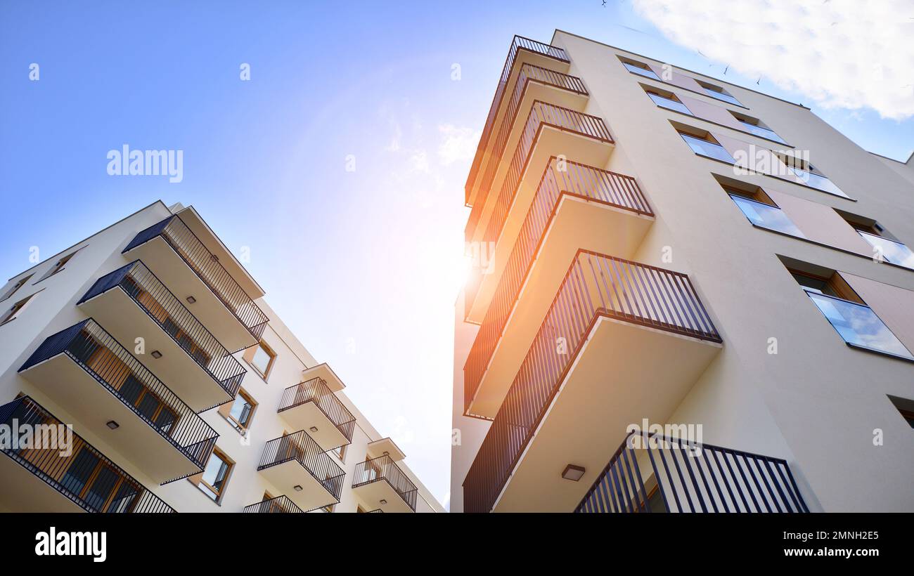 Futuristic square architecture of apartment building. Real estate with ...