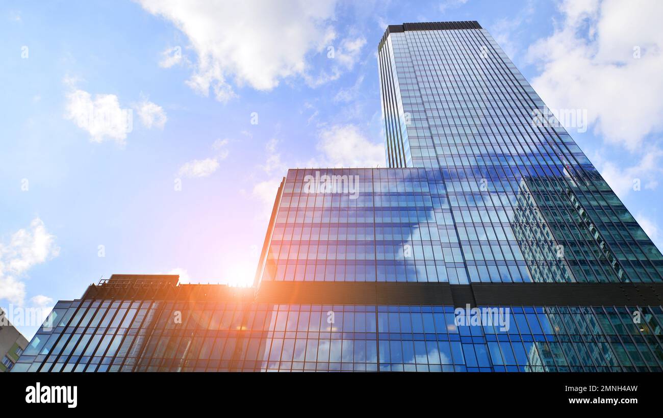 Abstract closeup of the glass-clad facade of a modern building covered ...