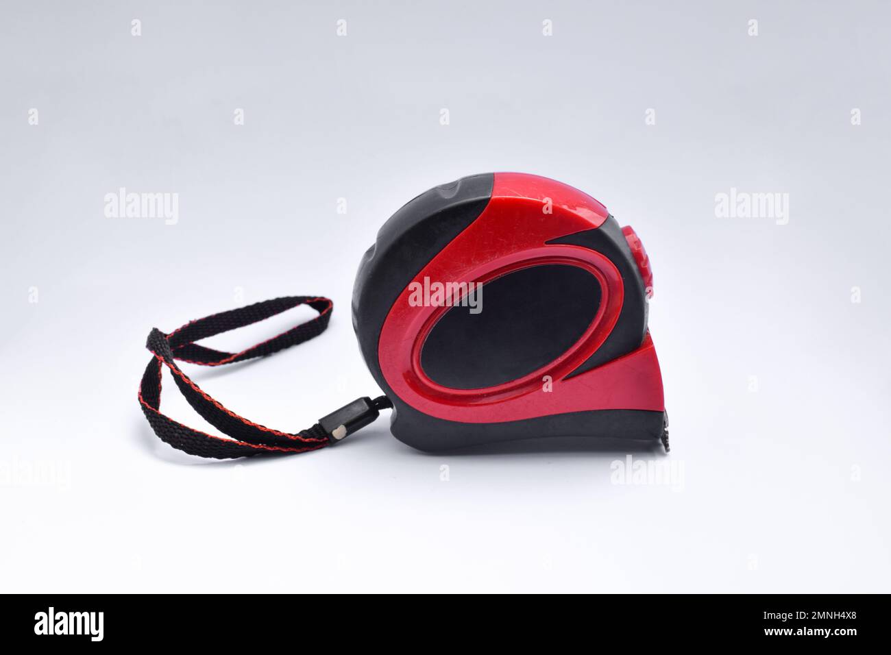 Roll-up metal meter for hobbies and work on a white background Stock ...