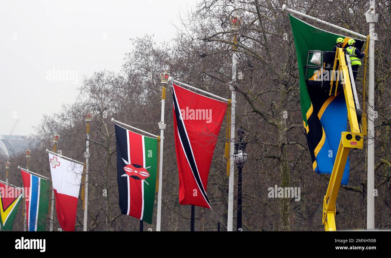 Flags of the Commonwealth countries are hung along The Mall in London ...
