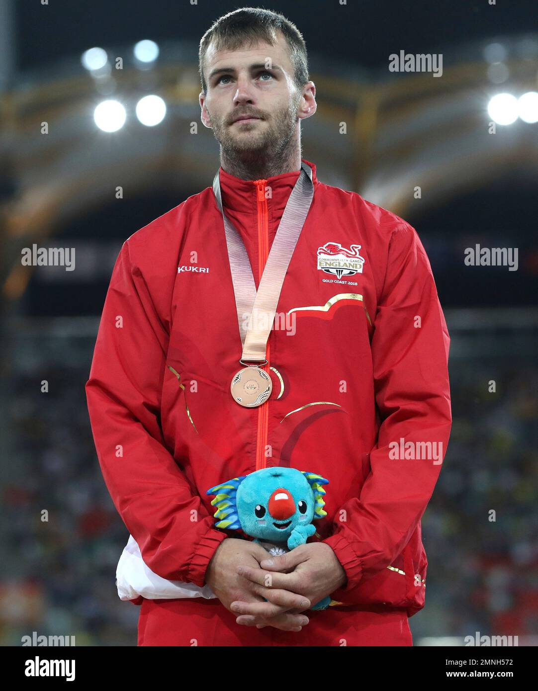 Men's pole vault bronze medalist England's Luke Cutts on the podium at Carrara Stadium during ...