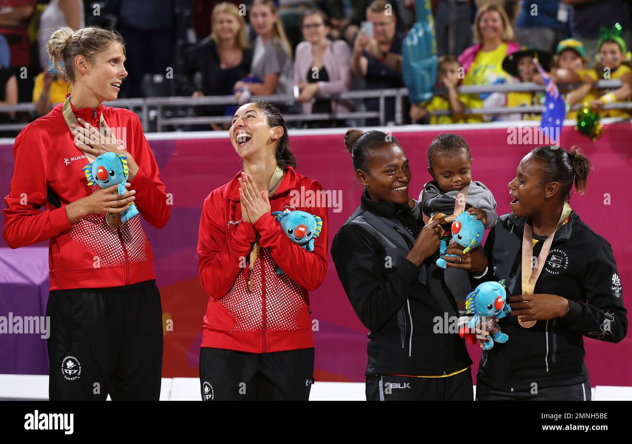 Canada's Sarah Pavan, left, and Melissa Humana-Paredes, second left ...