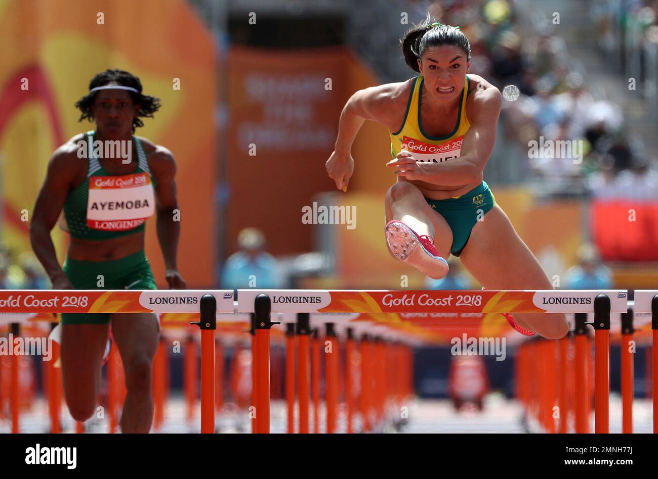 Australia's Michelle Jenneke competes in her women's 100m hurdles heat ...