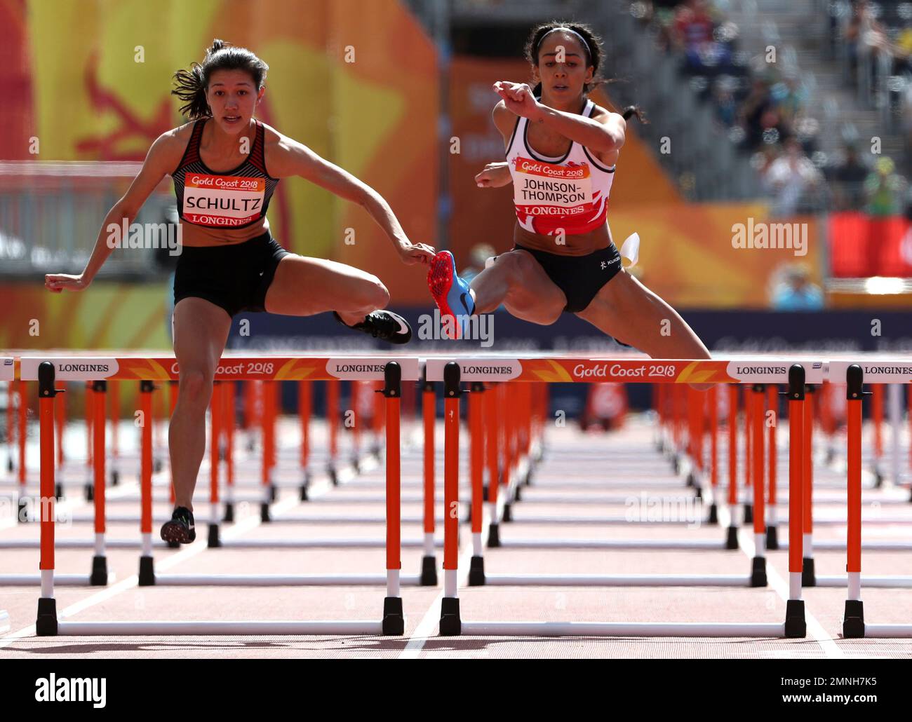 England's Katarina Johnson-Thompson, right, and Canada's Nina Schultz ...