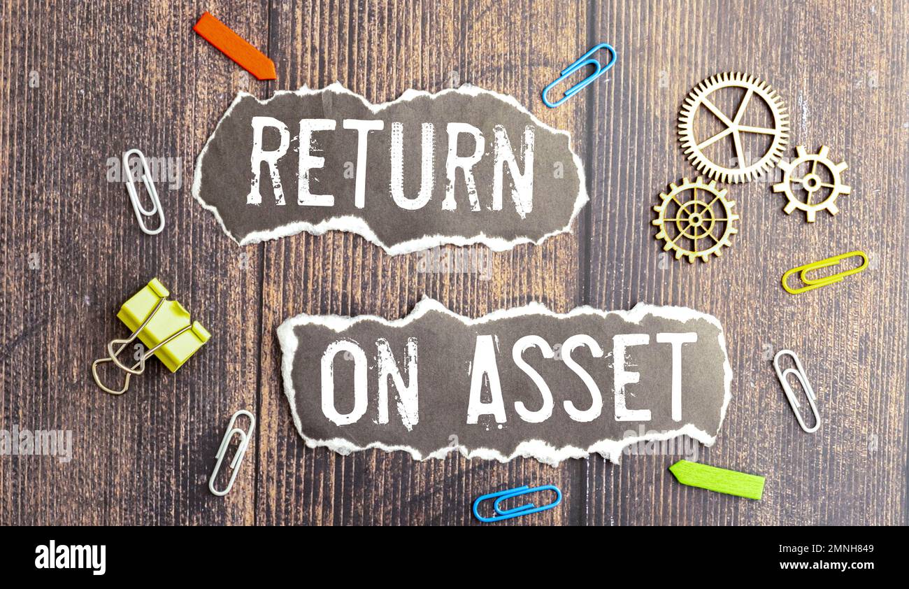 Home office workspace with keyboard, clipboard and pen with text RETURN ...