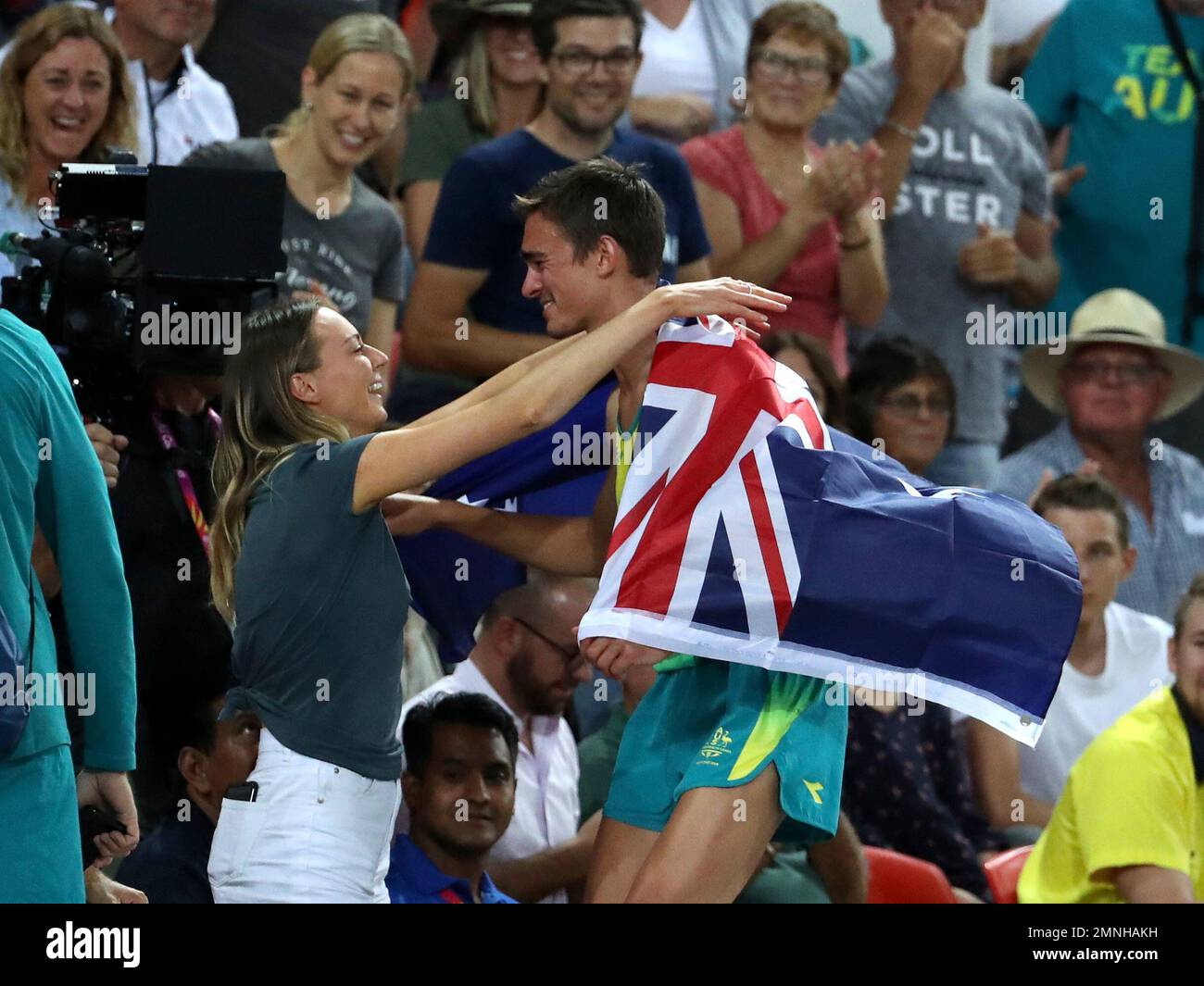 Australia's Brandon Starc is embraced by a friend as he celebrates ...