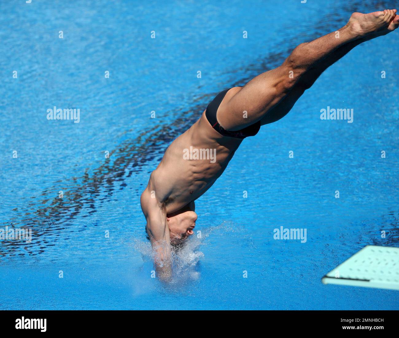 England's Jack Haslam makes a dive during the men's 1m springboard ...