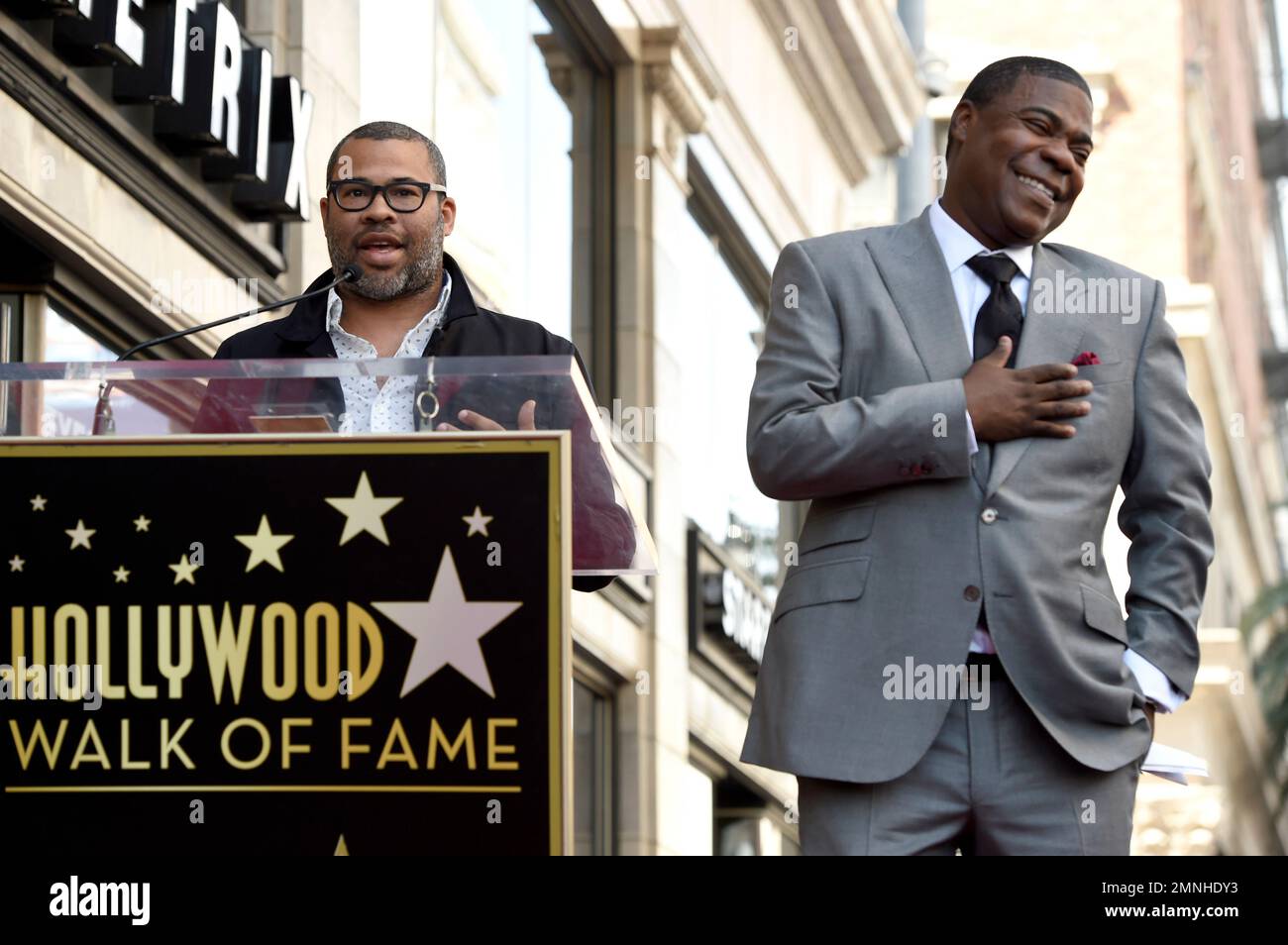 Jordan Peele, left, creator of the TV series "The Last O.G.," speaks as ...