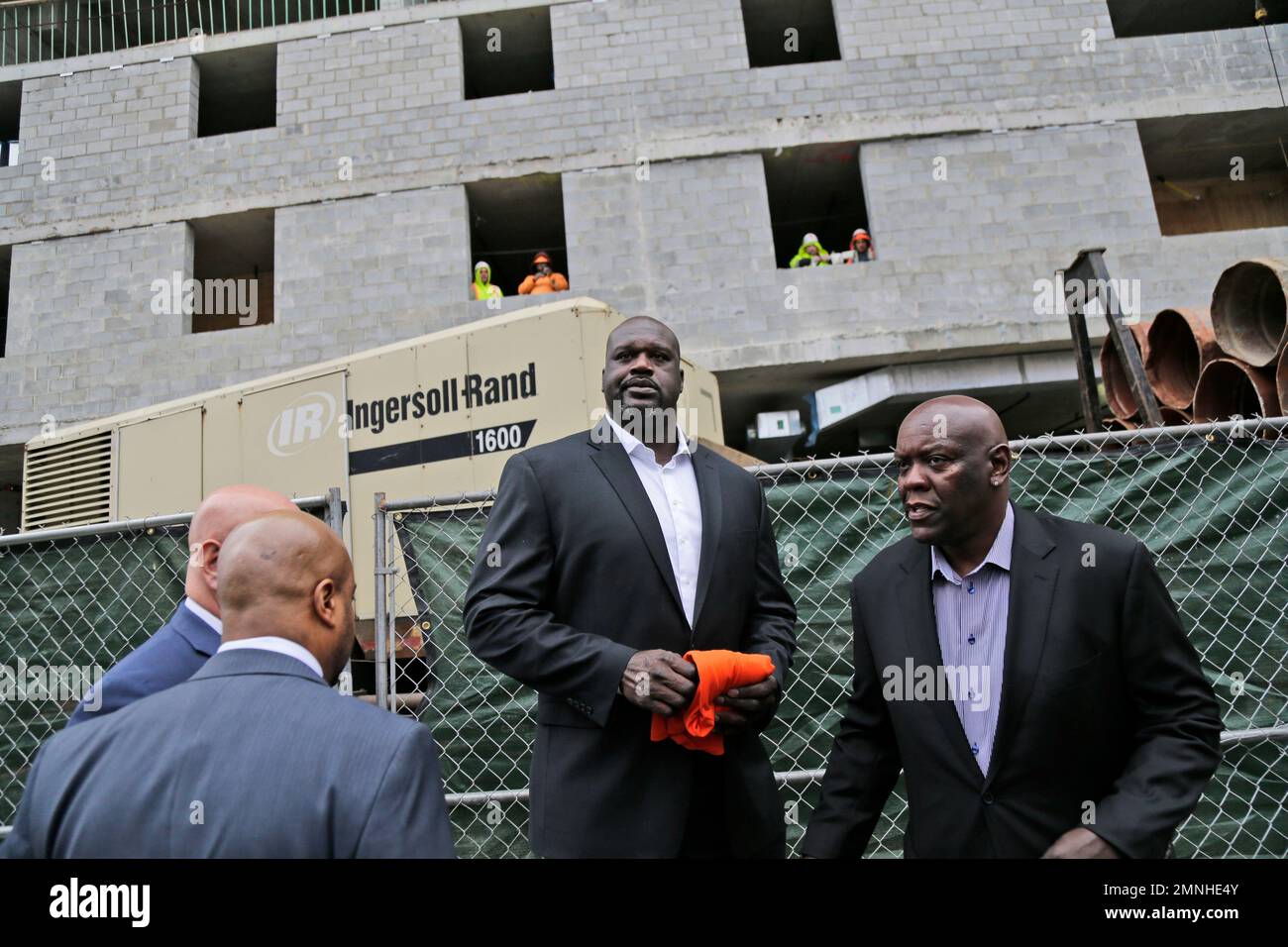 Newark-native Shaquille O'Neal, center, waits to pose for pictures in ...