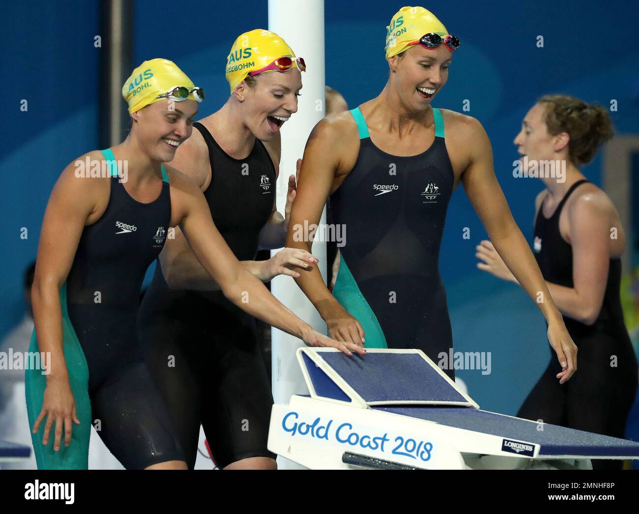 Australia's Georgia Bohl, left, Emily Seebohm and Emma McKeon, smile ...