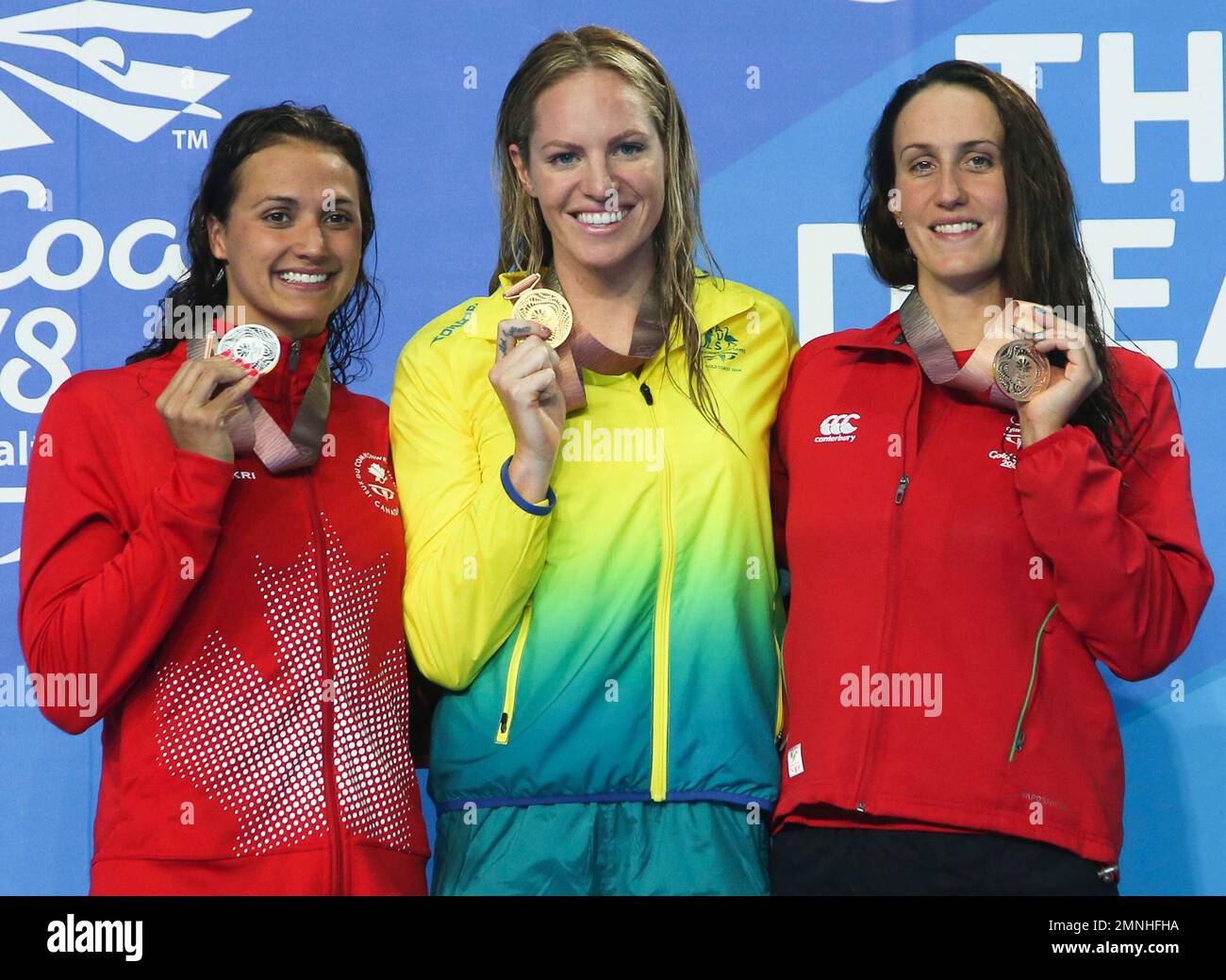 From left, Silver medalist Kylie Masse from Canada, Gold medalist Emily ...