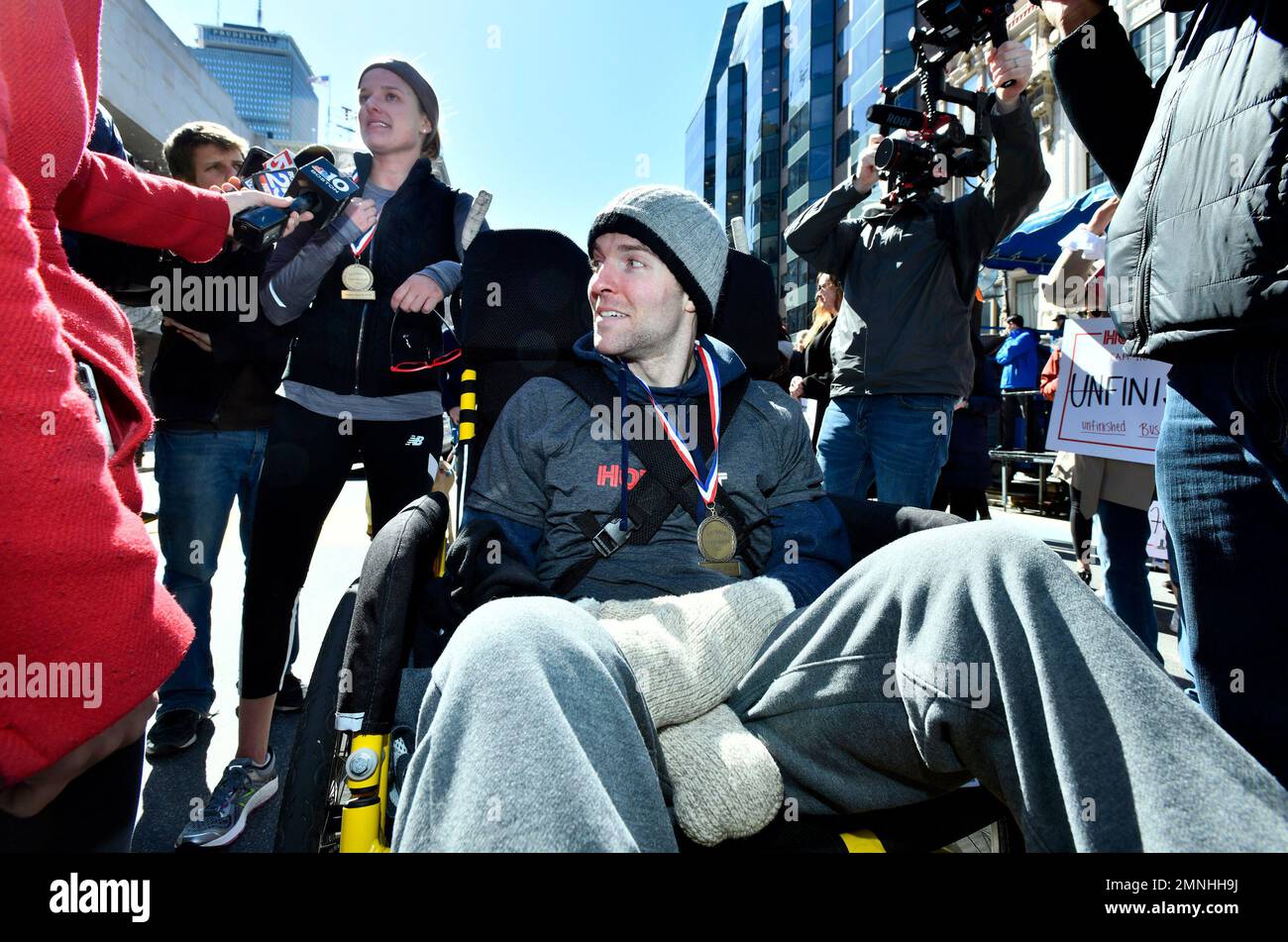 Kaitlyn Kiely, speeks to reporters as her boyfriend, Matt Wetherbee ...