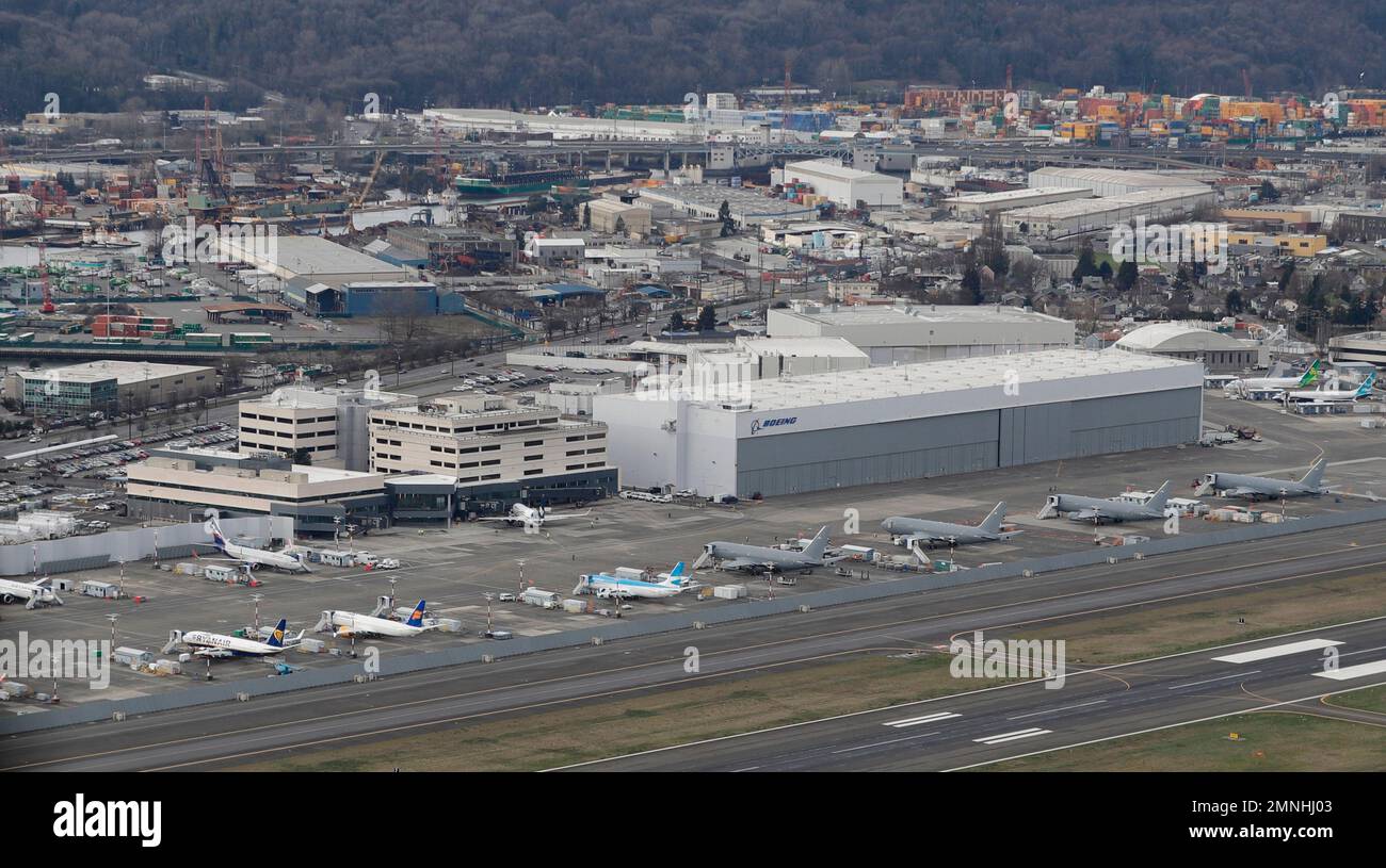 Airplanes are parked at a Boeing facility at Boeing Field, Friday, Feb ...