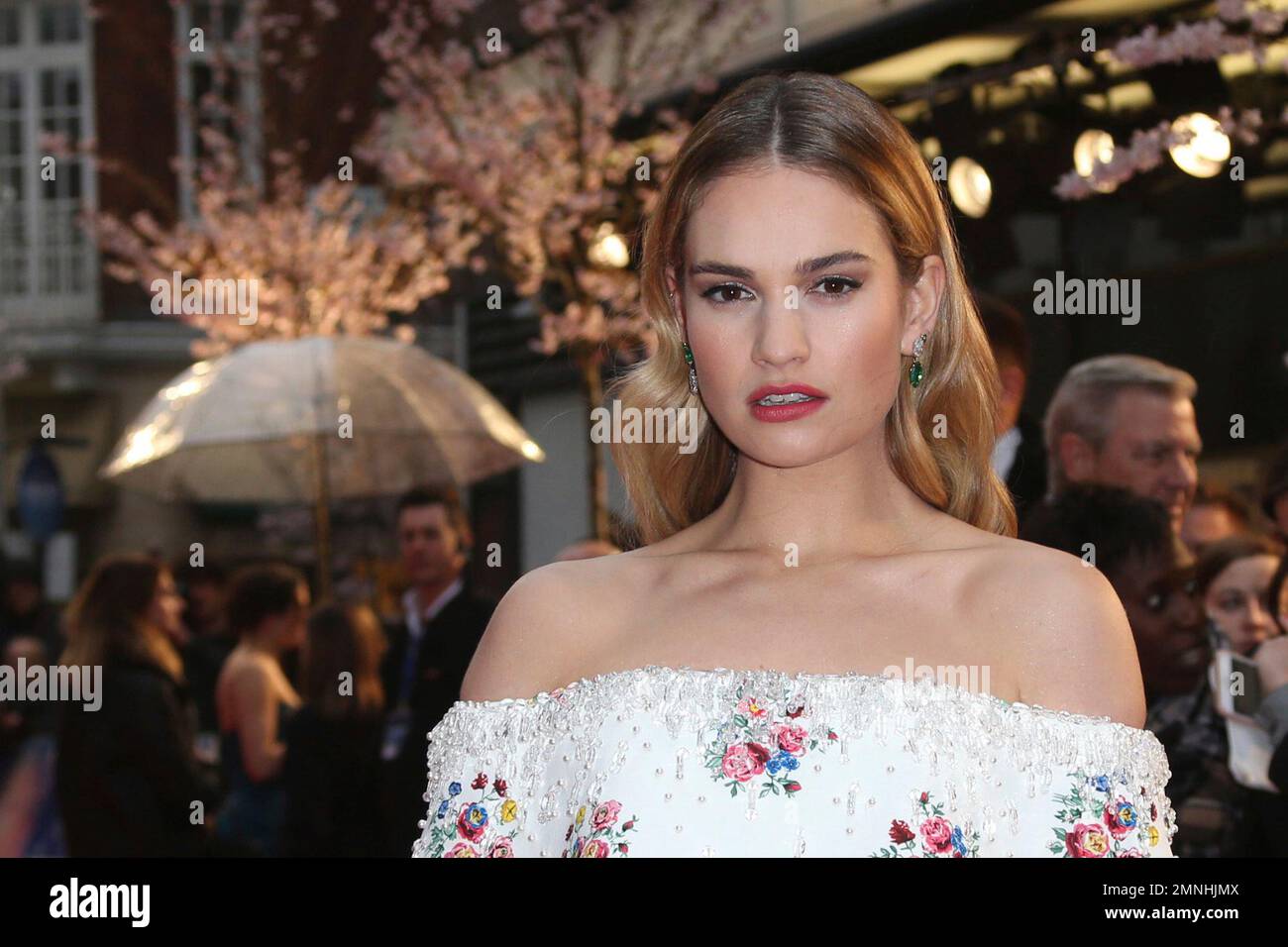Actress Lily James poses for photographers upon arrival at the premiere ...