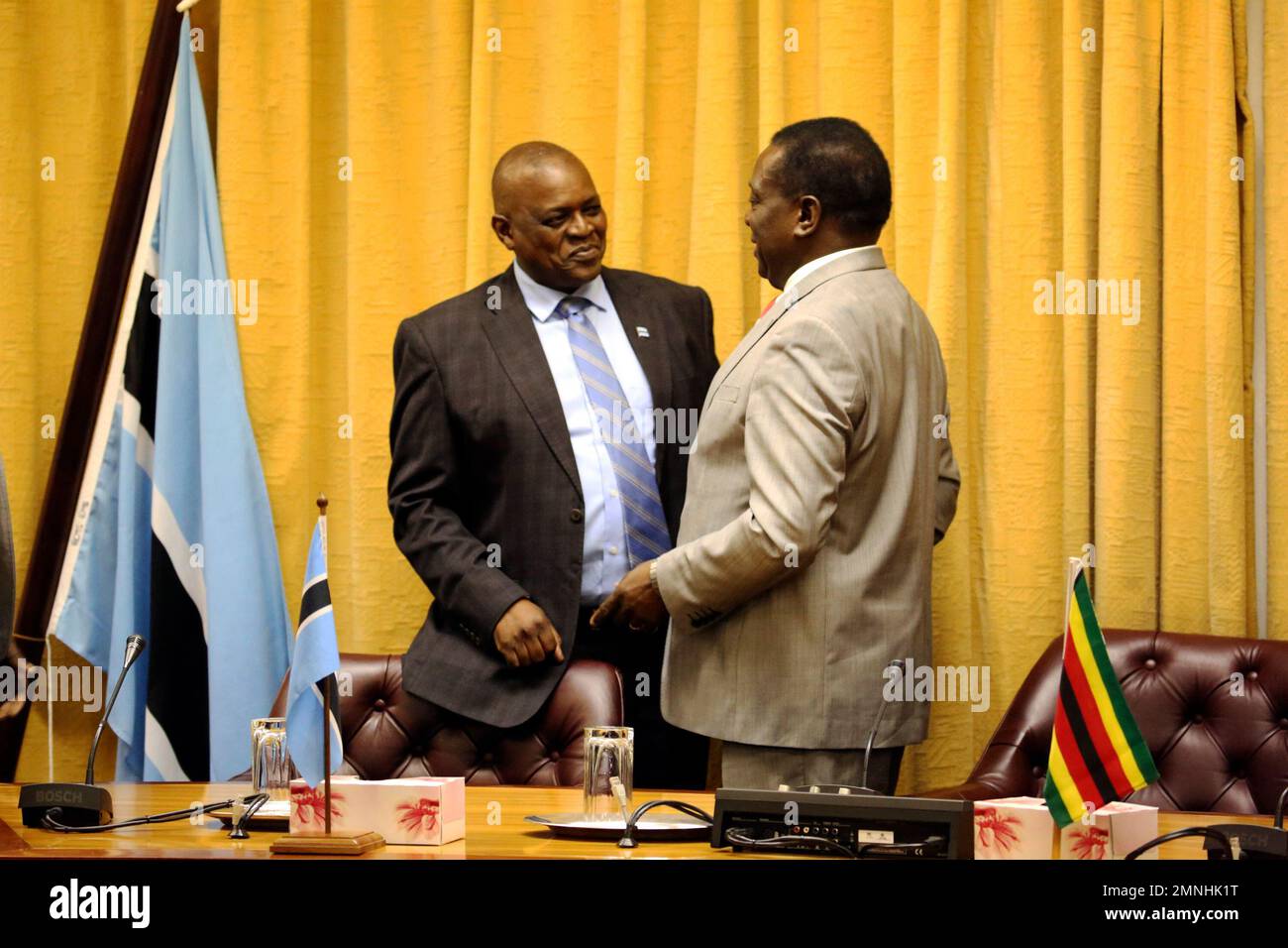 Botswana's new President Mokgweesti Masis, left, meets with Zimbabwean ...