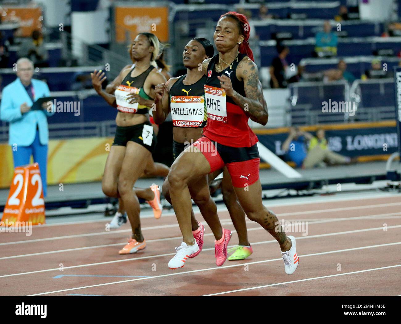 Michelle-Lee Ahye of Trinidad and Tobago crosses the finish line to win the women's 100m final ...