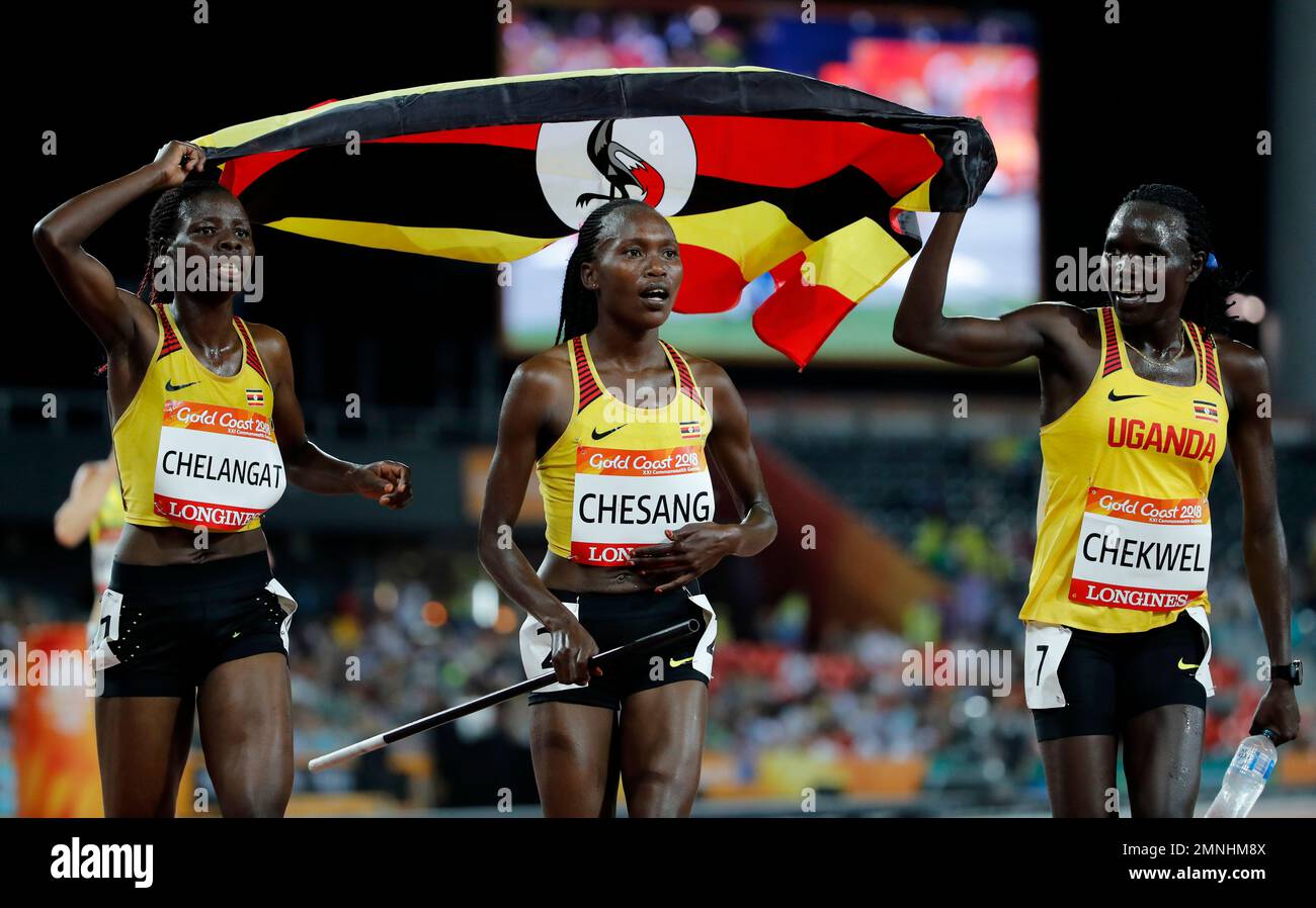 Uganda's Stella Chesang, centre, celebrates her win in the women's 10 ...