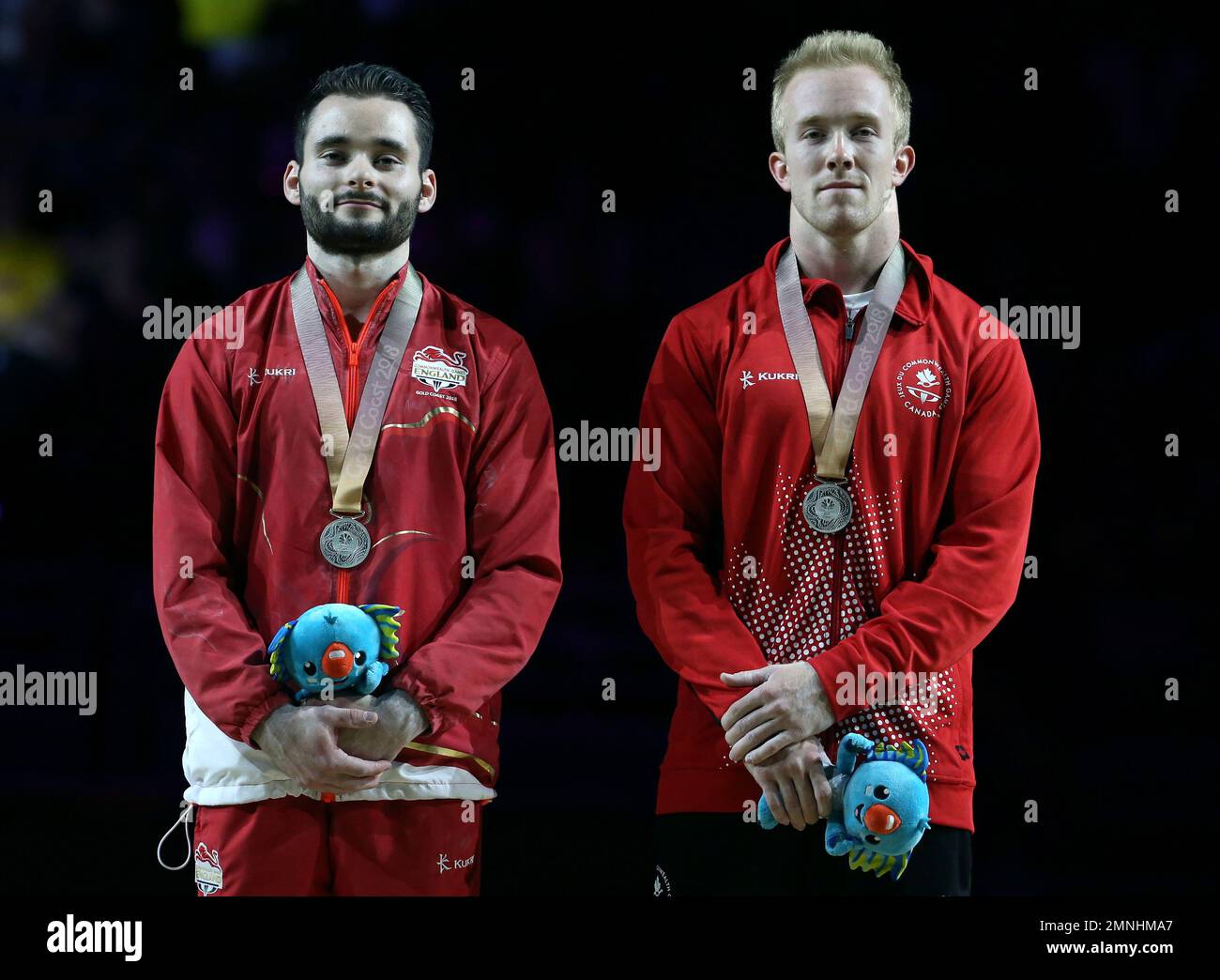 Men's horizontal bar dual silver medalists Canada's Cory Paterson and ...