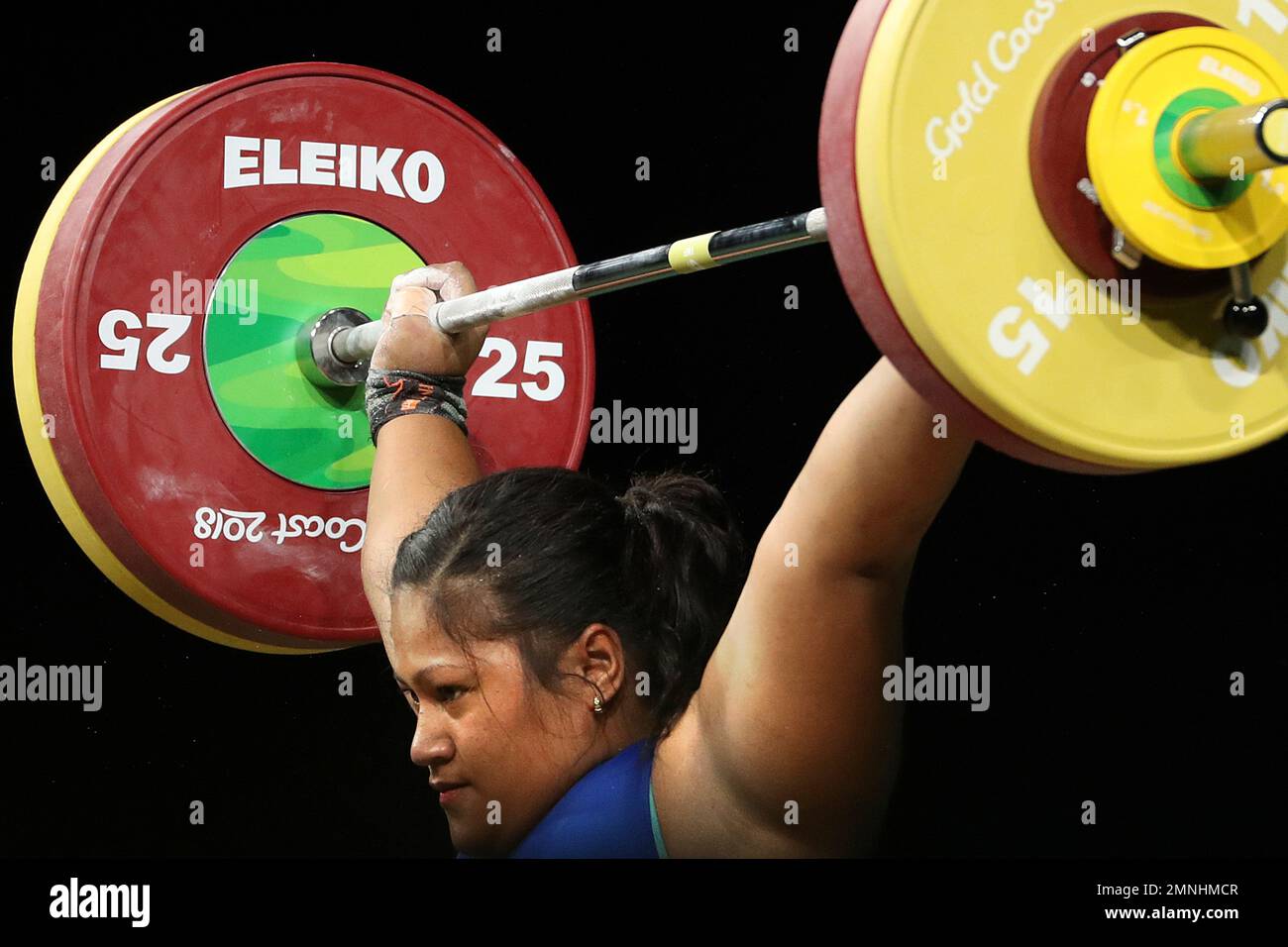 Feagaiga Stowers of Samoa lifts while competing in the snatch in women ...