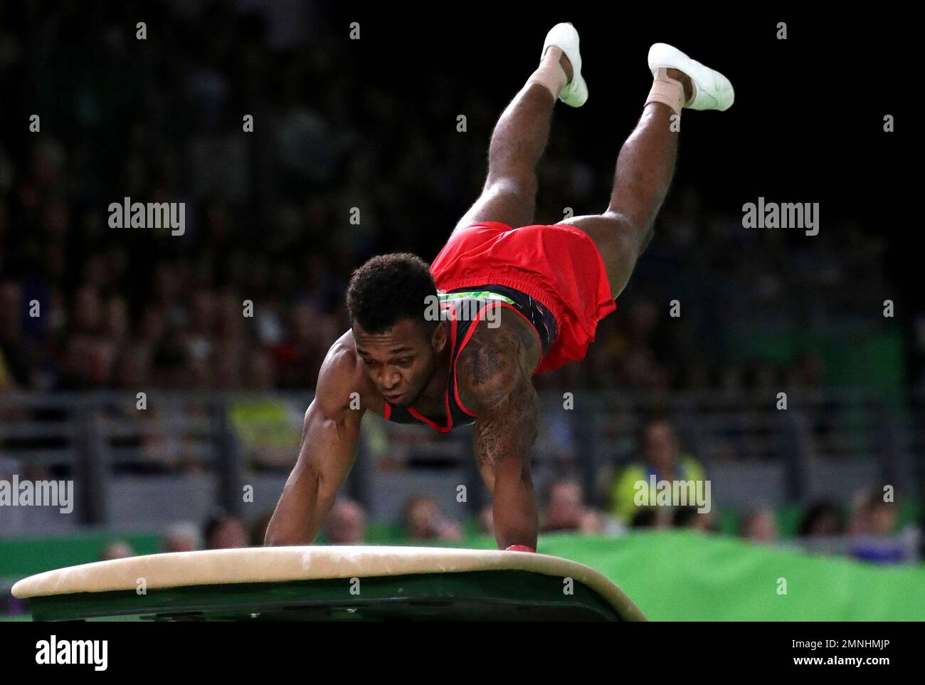England's Courtney Tulloch competes in the men's vault final during the ...