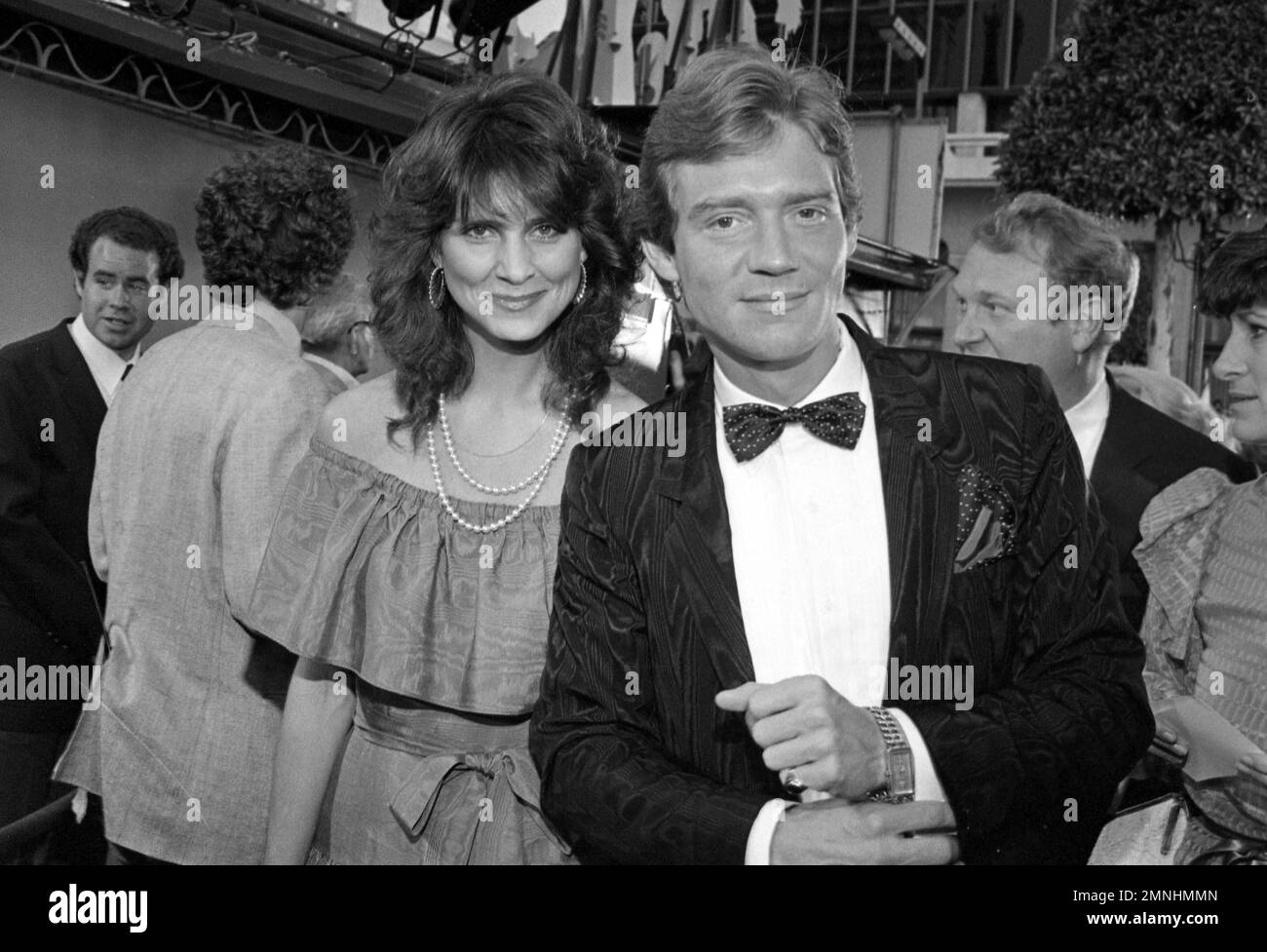 Anthony Andrews with Holly Palance at the premiere of Annie at Mann's ...