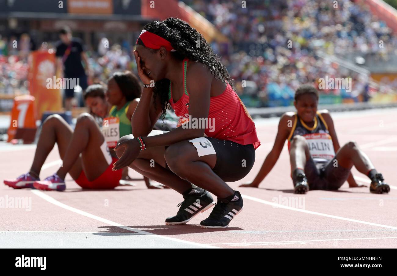 Kenya's Maximila Imali reacts after her heat of the women's 400m heat ...