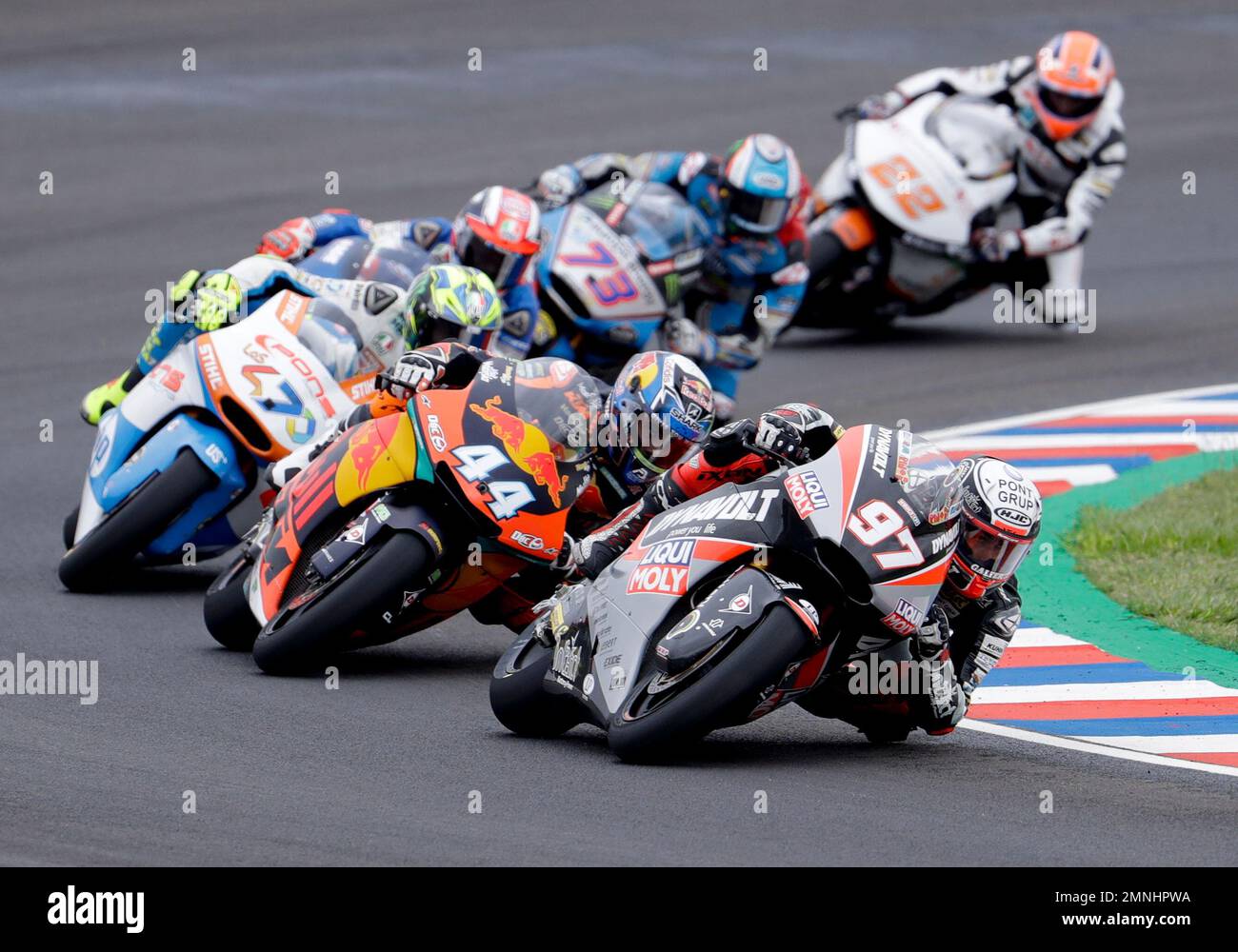 Spain's Moto2 racer Xavi Vierge, right, raxes his Kalex during ...